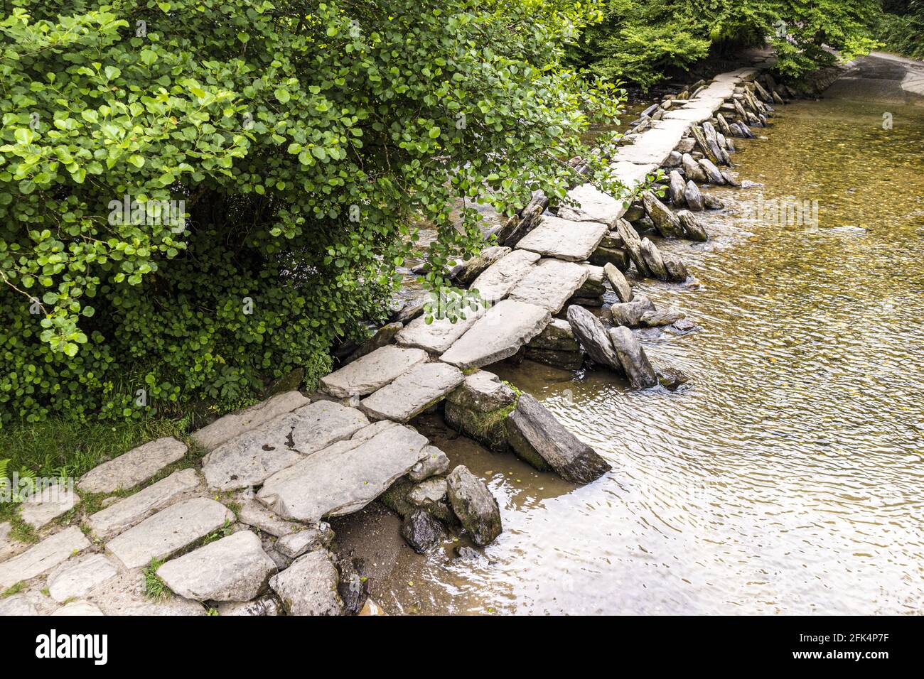 Tarr Steps - An ancient clapper bridge crossing the River Barle on ...