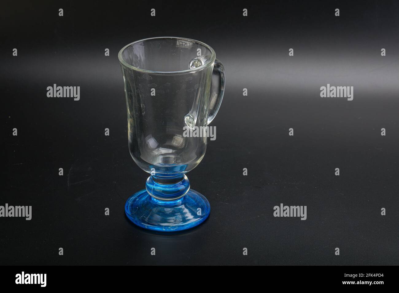 Empty glass cup for drinks isolated Stock Photo - Alamy