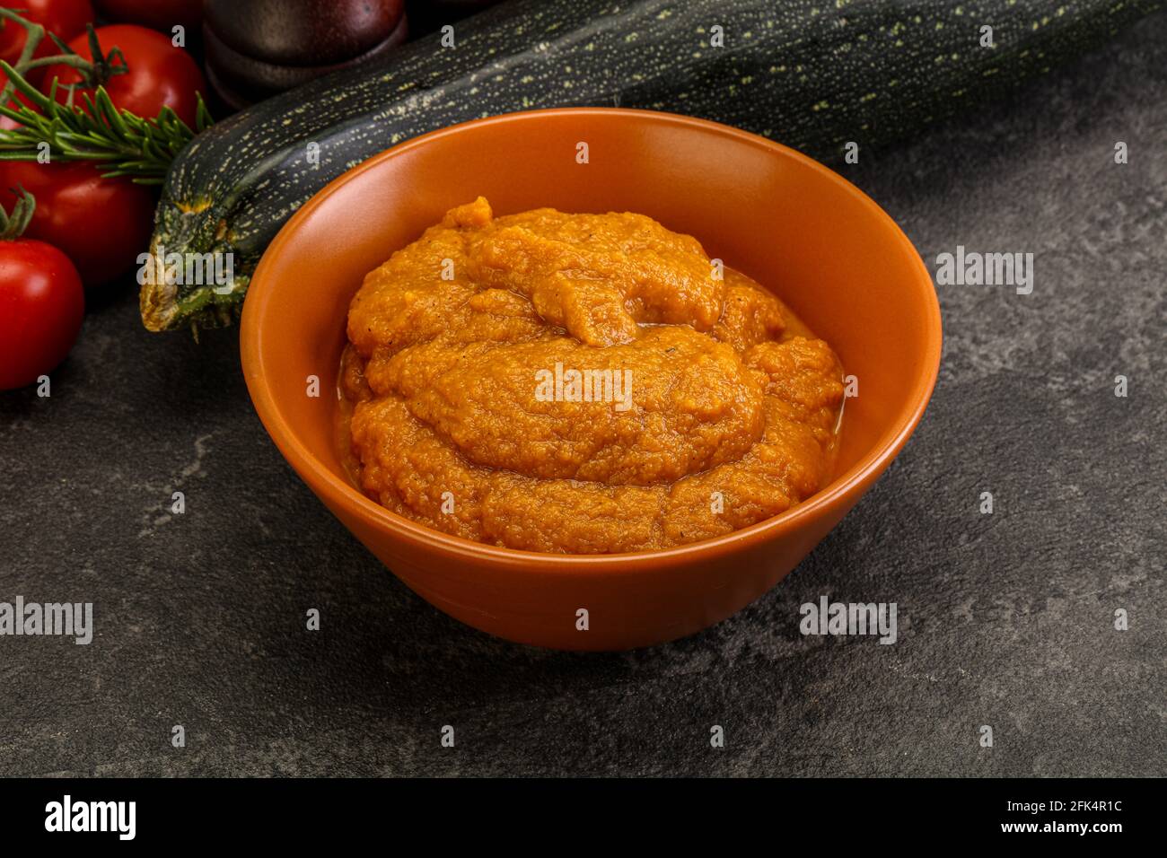 Vegetarian cuisine - Zucchini puree with herbs and spices Stock Photo ...