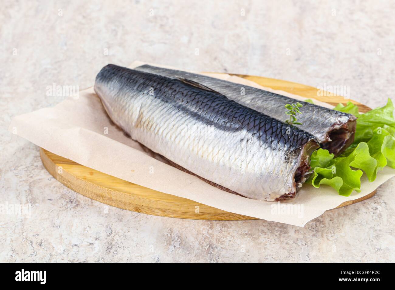 Marinated Herring fillet with skin for cooking Stock Photo - Alamy