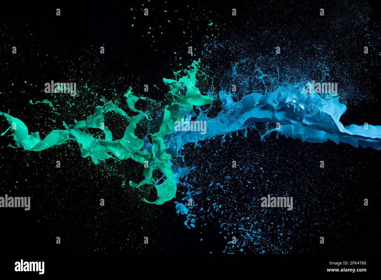 abstract liquid color splash on black background Stock Photo - Alamy