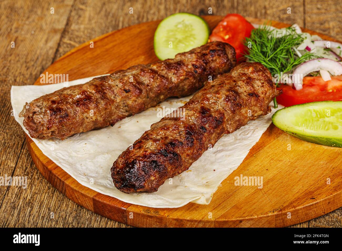 Beef skewer minced meat shashlik served vegetables Stock Photo - Alamy