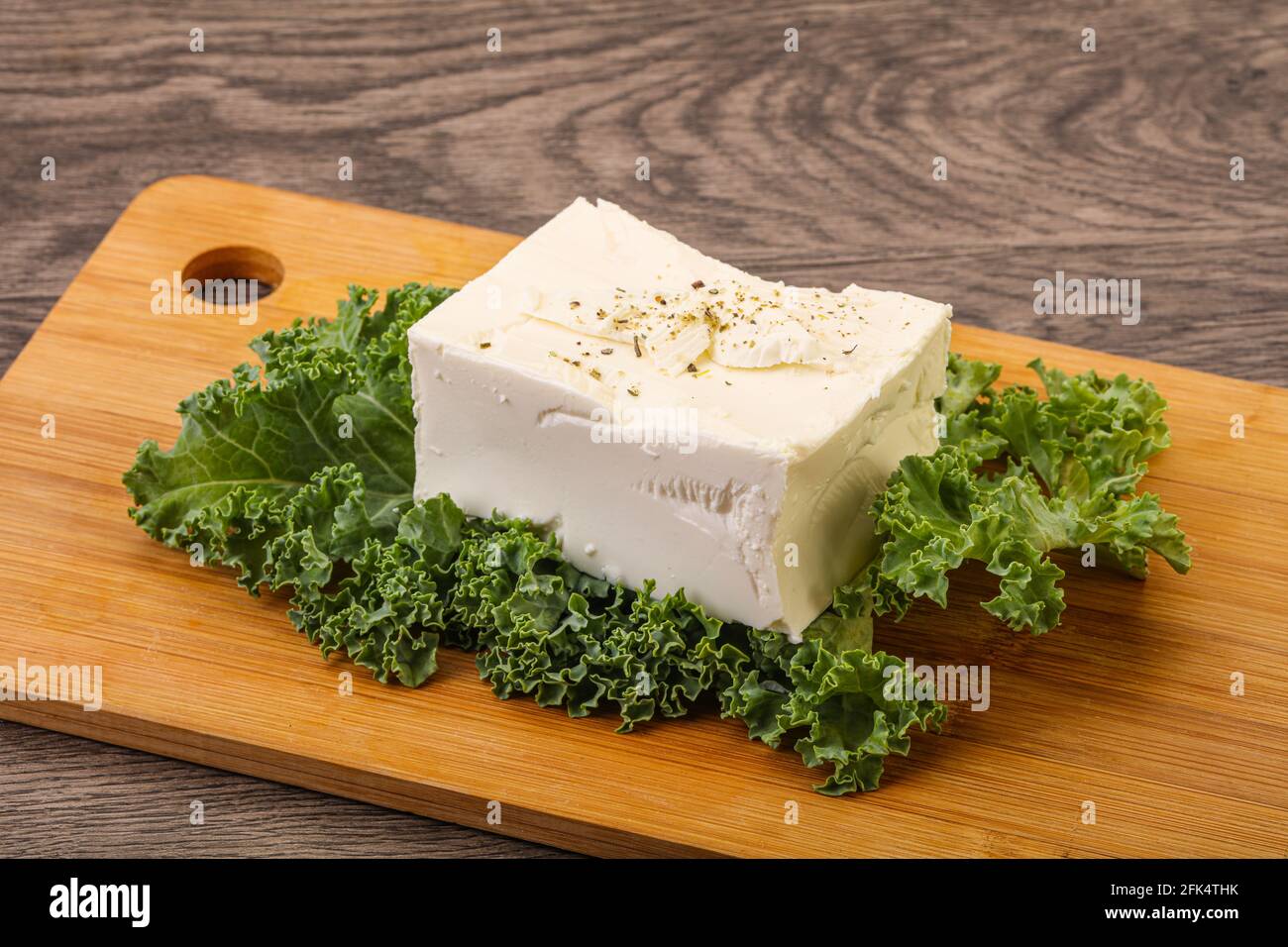 Traditional tasty Greek Feta soft cheese brick Stock Photo - Alamy