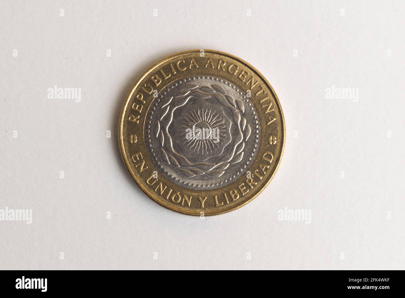 Argentine two peso coin front on white background Stock Photo - Alamy
