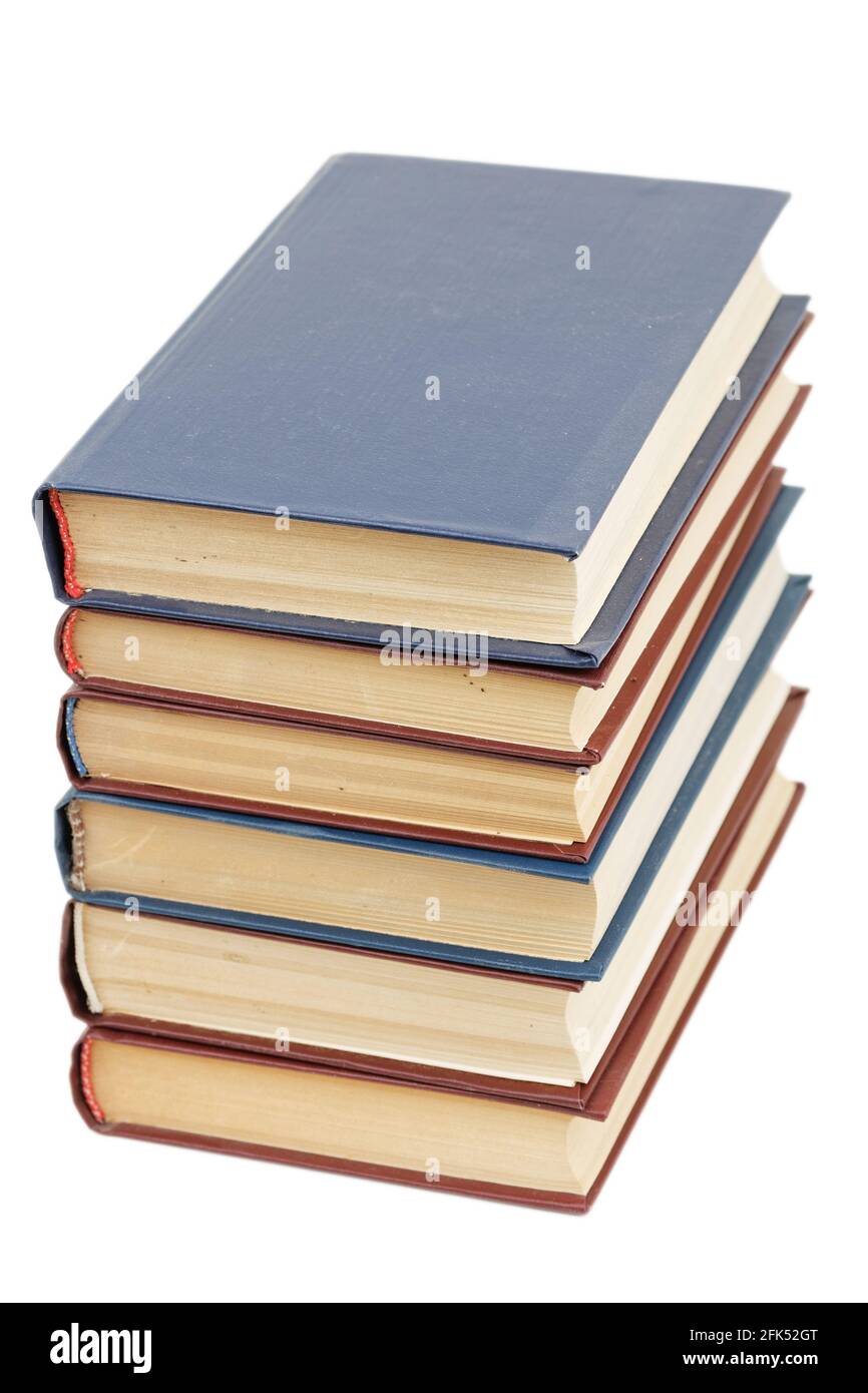 A stack of old books isolated on white. Angle view. Shallow focus Stock ...