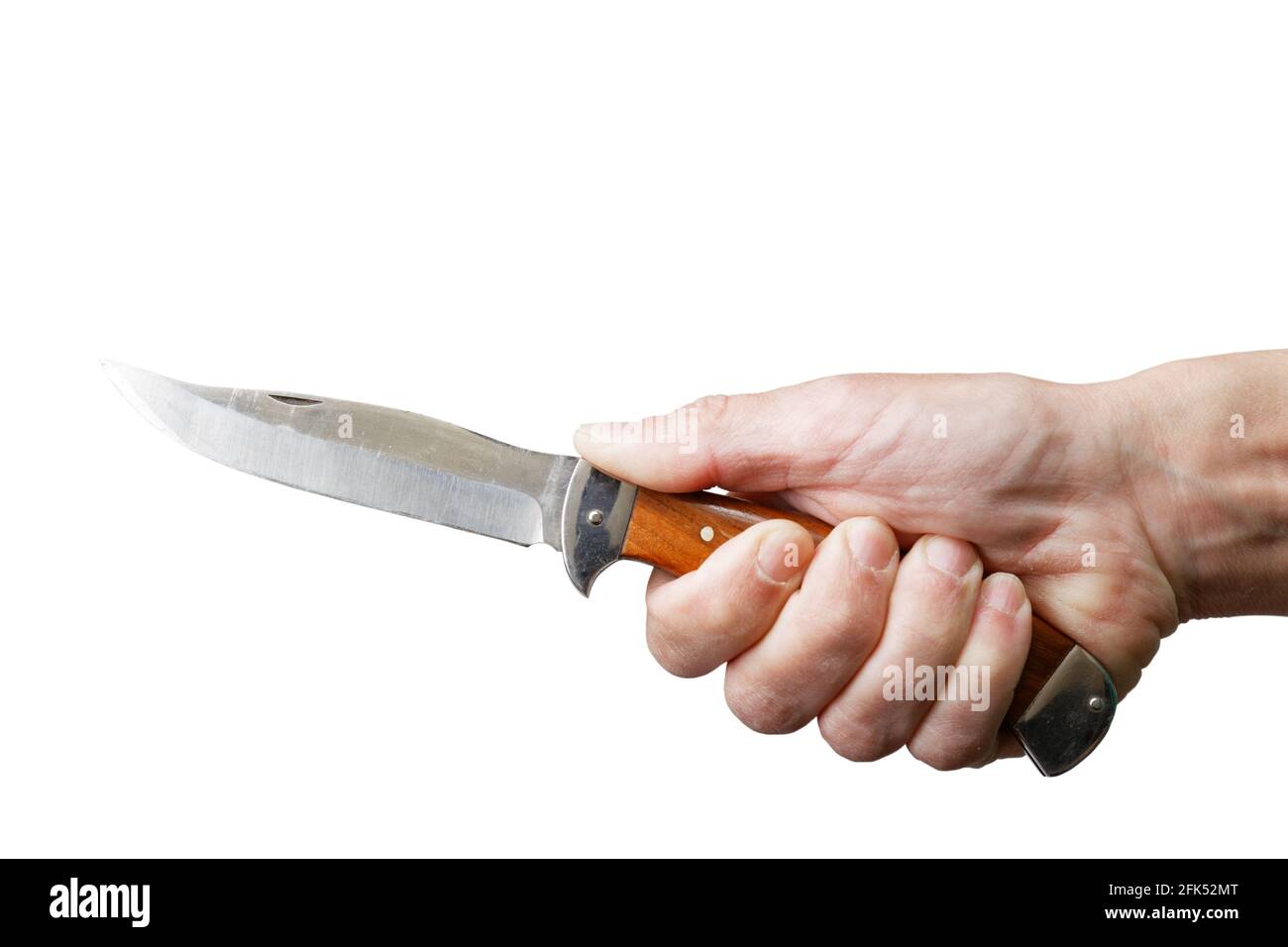 Closeup humans hand holds a folding knife with a wooden handle isolated ...
