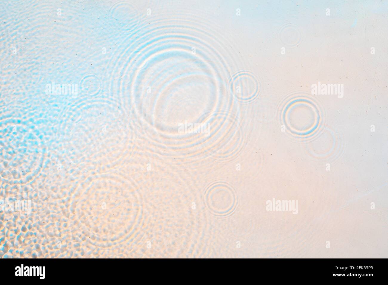 Light wavy with rainbow colors abstract rippled water texture ...