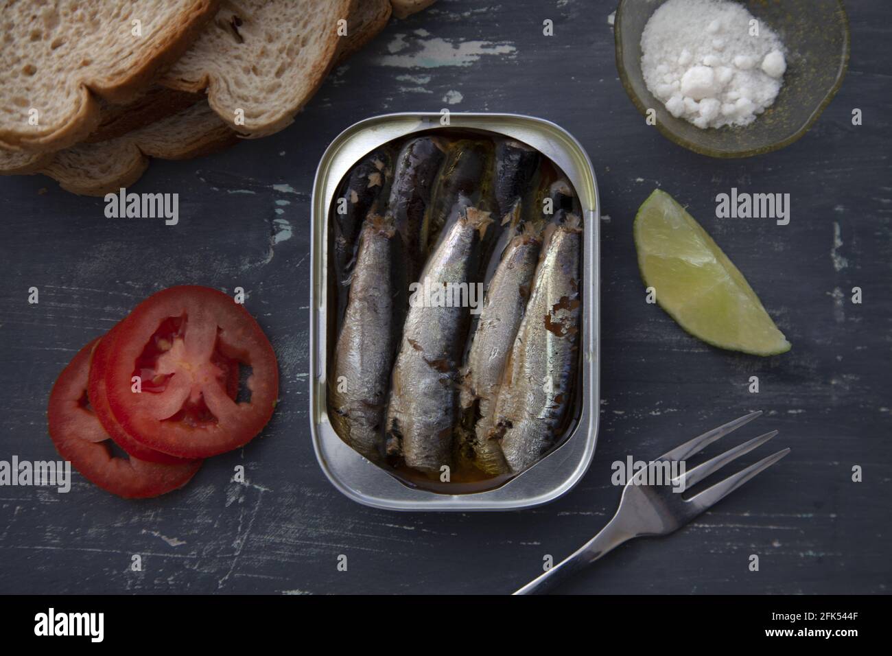 Top view of canned sardines with slices of bread Stock Photo - Alamy