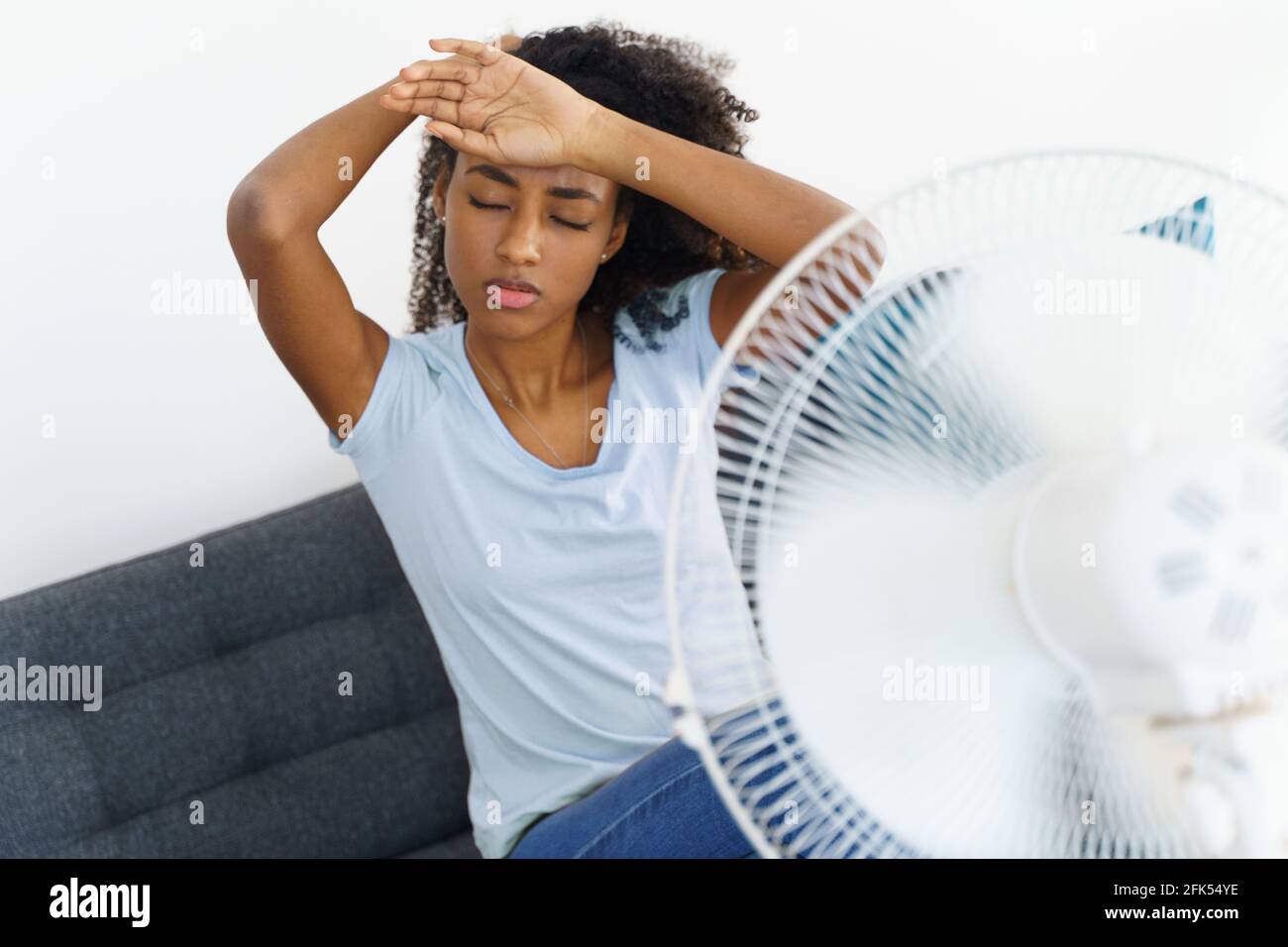 Heatwave woman air conditioner hi-res stock photography and images - Alamy