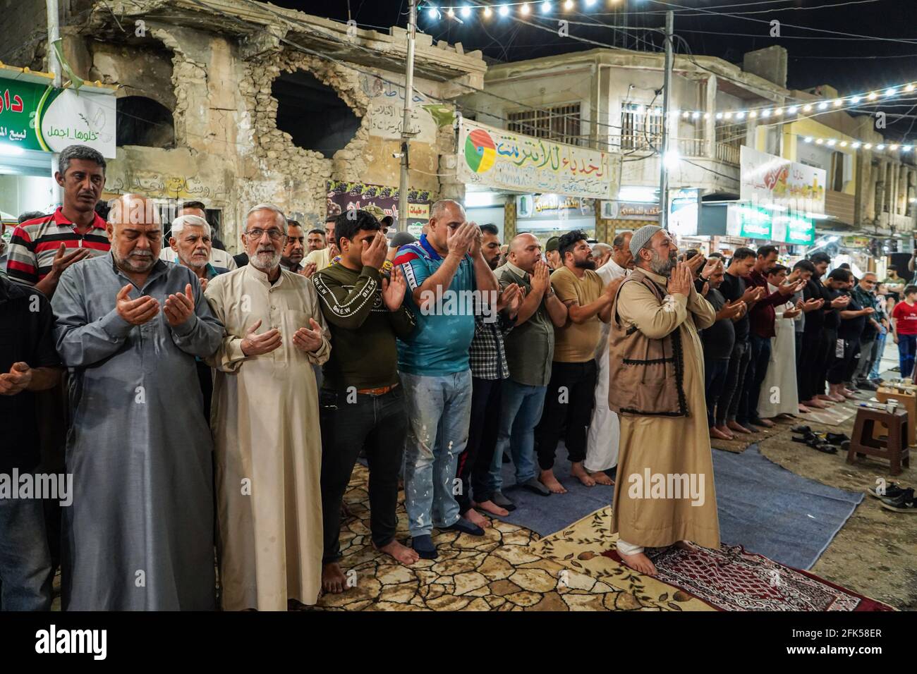 Mosul, Iraq. 27th Apr, 2021. Muslims in Iraqi perform the absentee ...