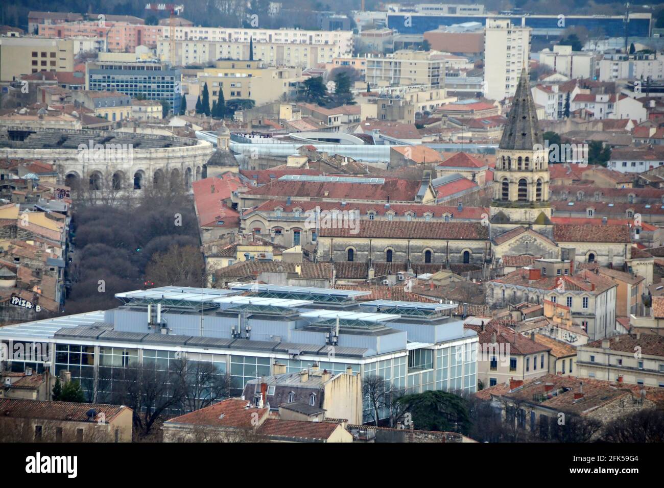 Aerial view of the old town of Nimes, France, including the roman ...