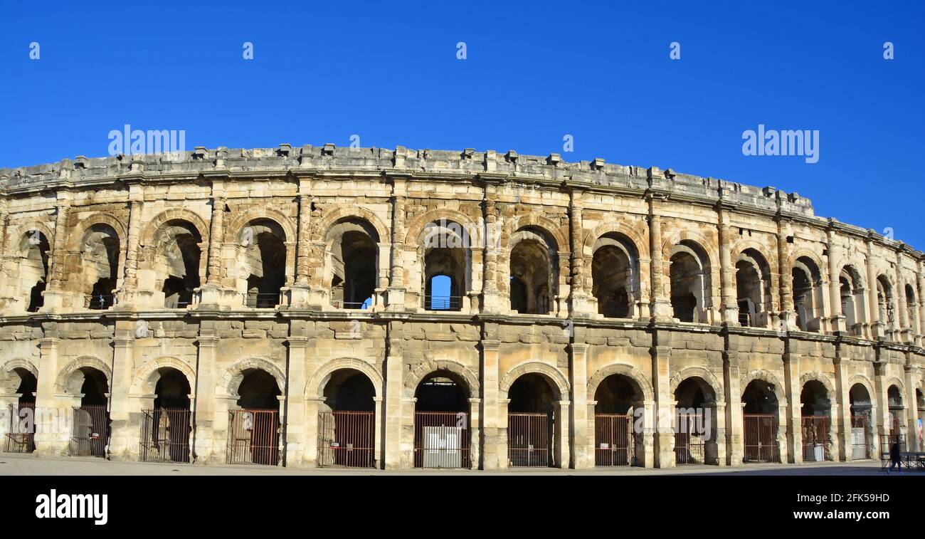 The outer wall of the Ancient Roman Amphitheatre at Nimes in the South ...