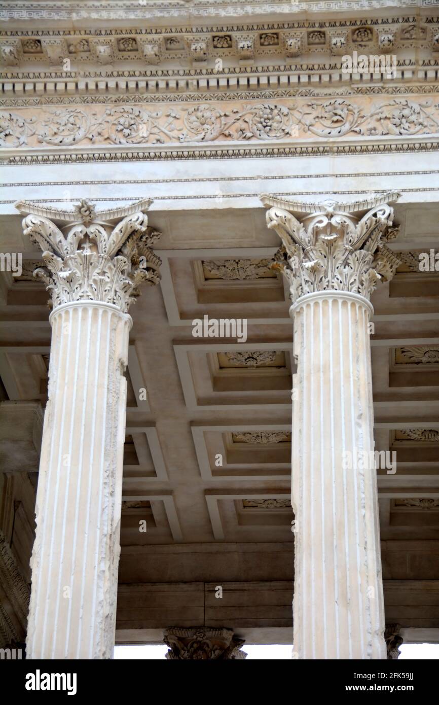 Capitals and entablature of two Corinthian Columns in the pronaos of an ...