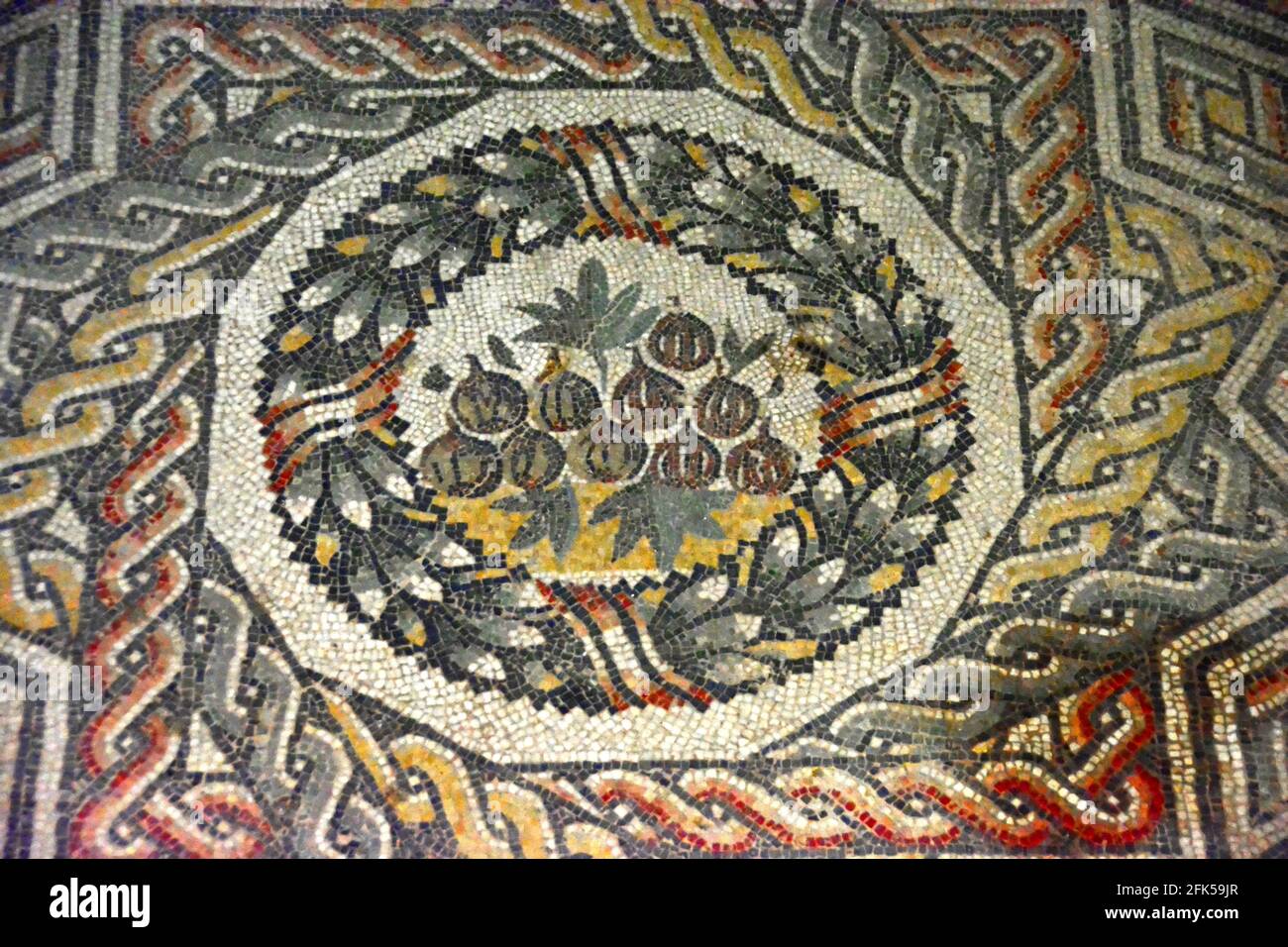 Ancient Roman mosaic floor with a picture of figs. In the UNESCO listed ...