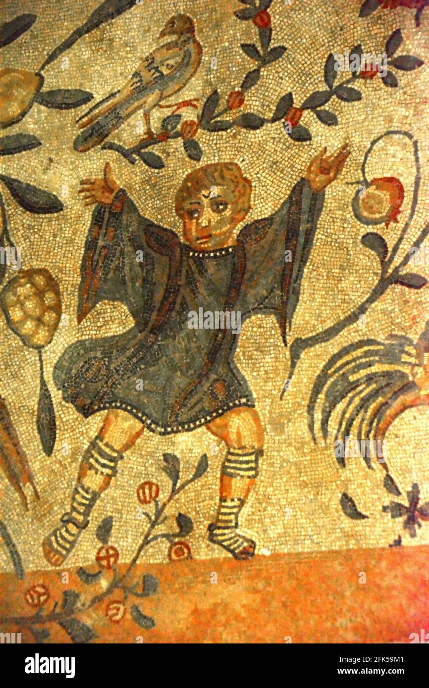 Ancient Roman mosaic of a boy afraid, with his arms in the air. From ...