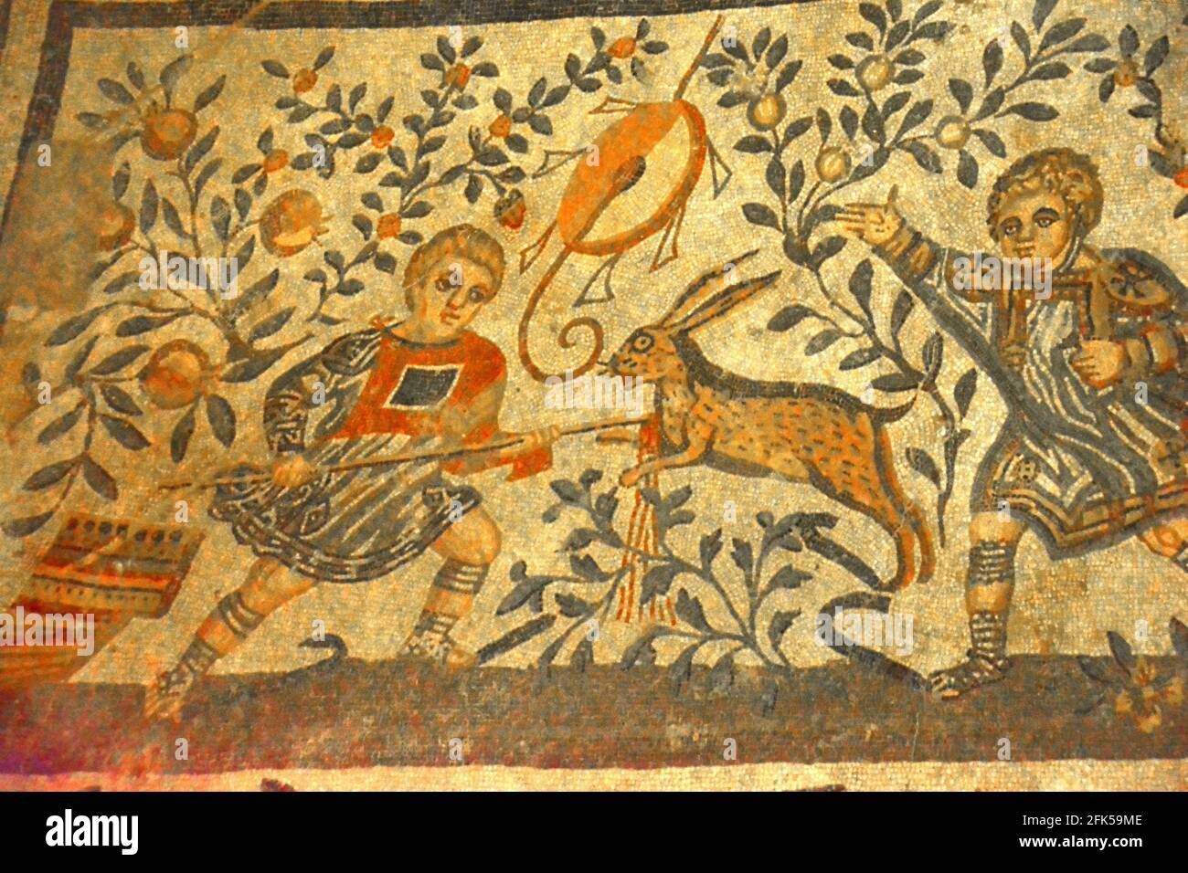 Ancient Roman mosaic of a boy spearing a hare and some blood. From the ...