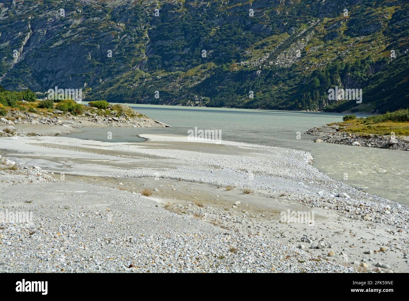 The River Aar flowing into the Grimsel Lake below the Grimsel Pass in ...