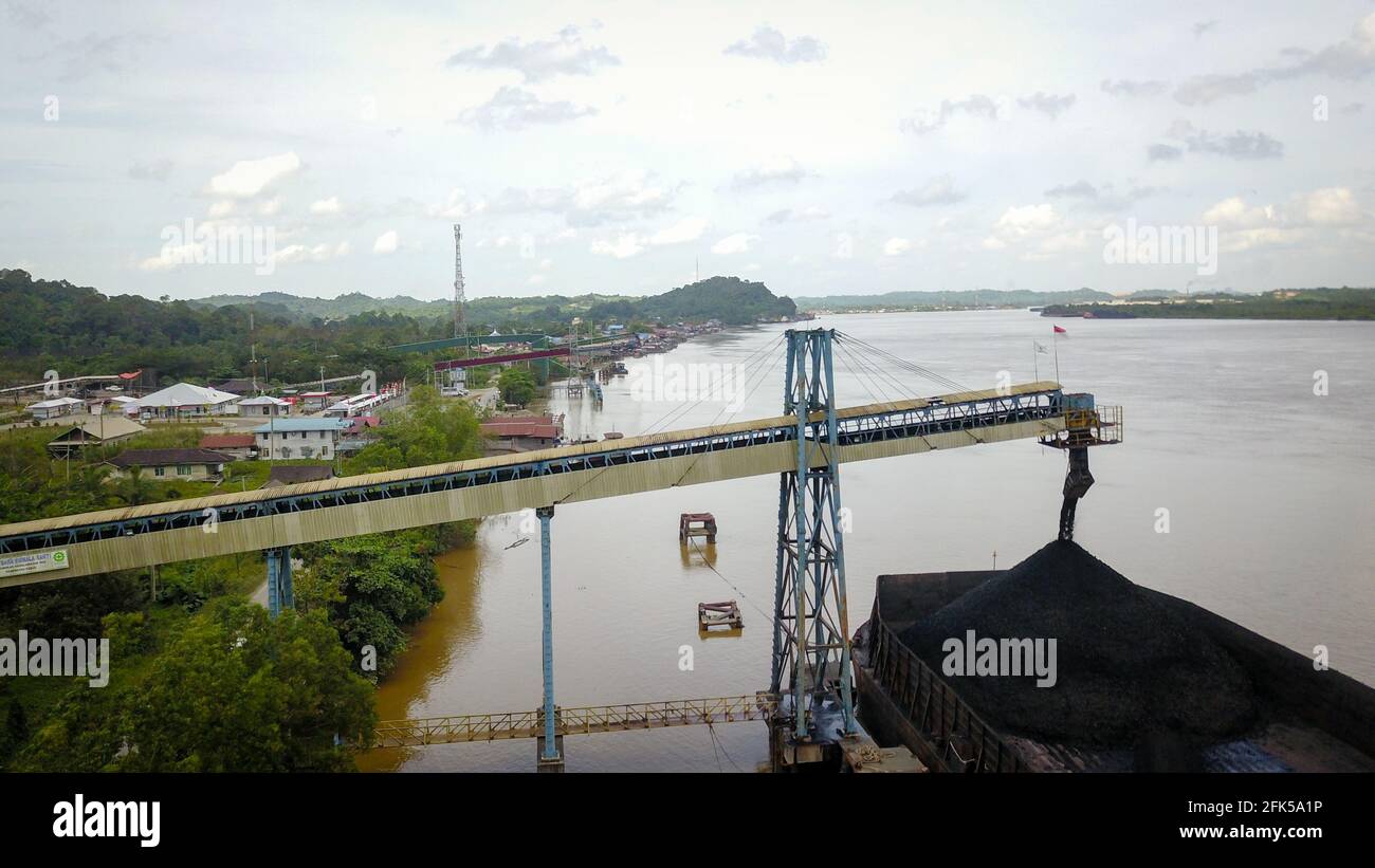 Coal Shipping in indonesia, loading the coal onto the barge aerial view ...