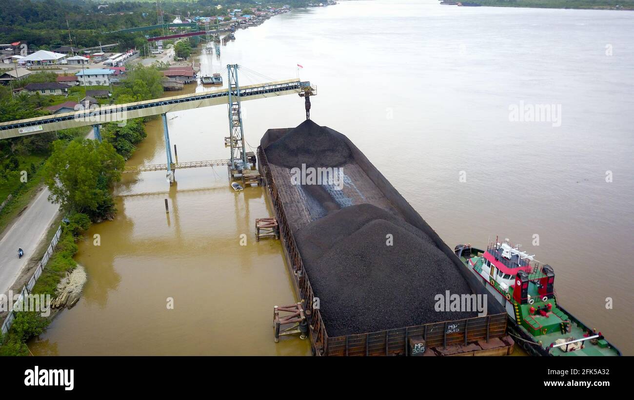 Coal Shipping in indonesia, loading the coal onto the barge aerial view ...