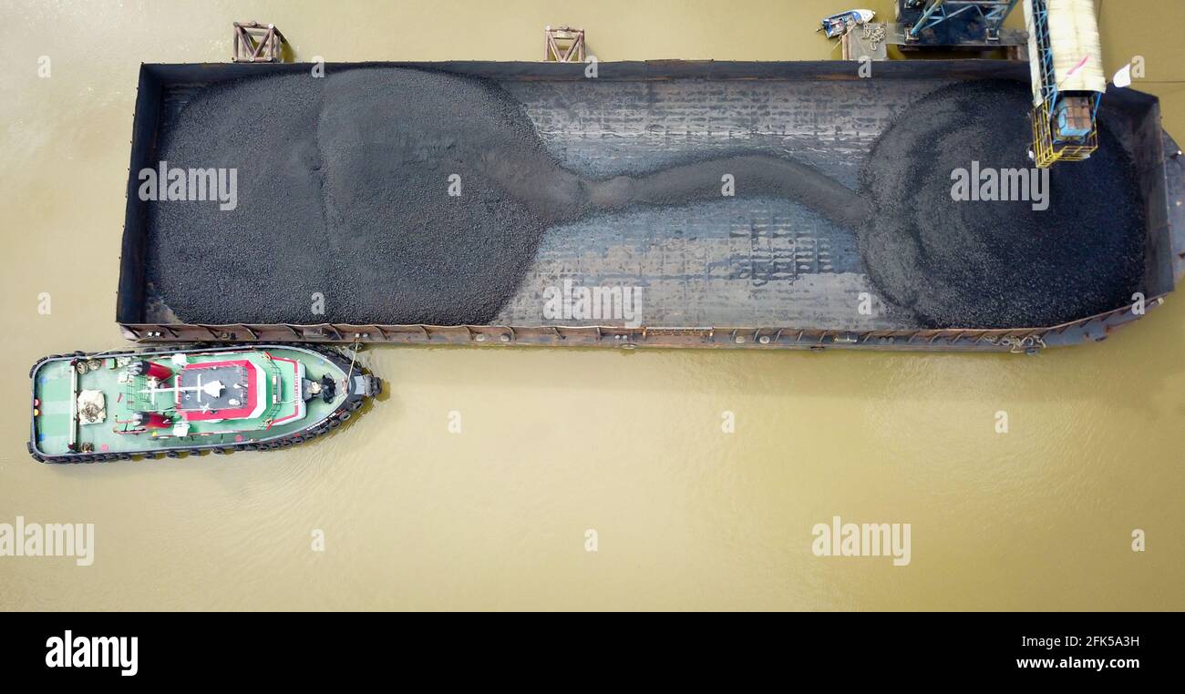 Coal Shipping in indonesia, loading the coal onto the barge aerial view ...