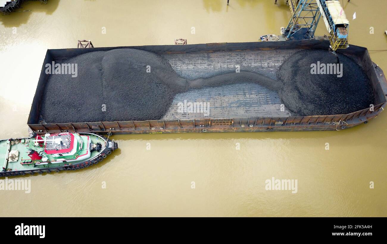 Coal Shipping in indonesia, loading the coal onto the barge aerial view ...