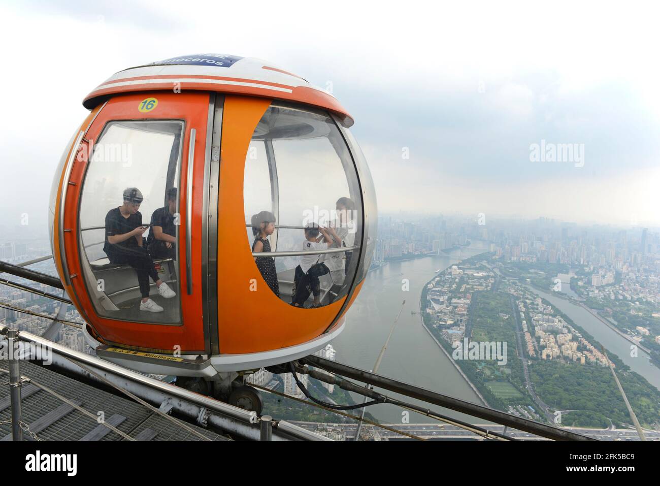 Visitor pods on the world's highest ferris wheel on top of the Canton ...