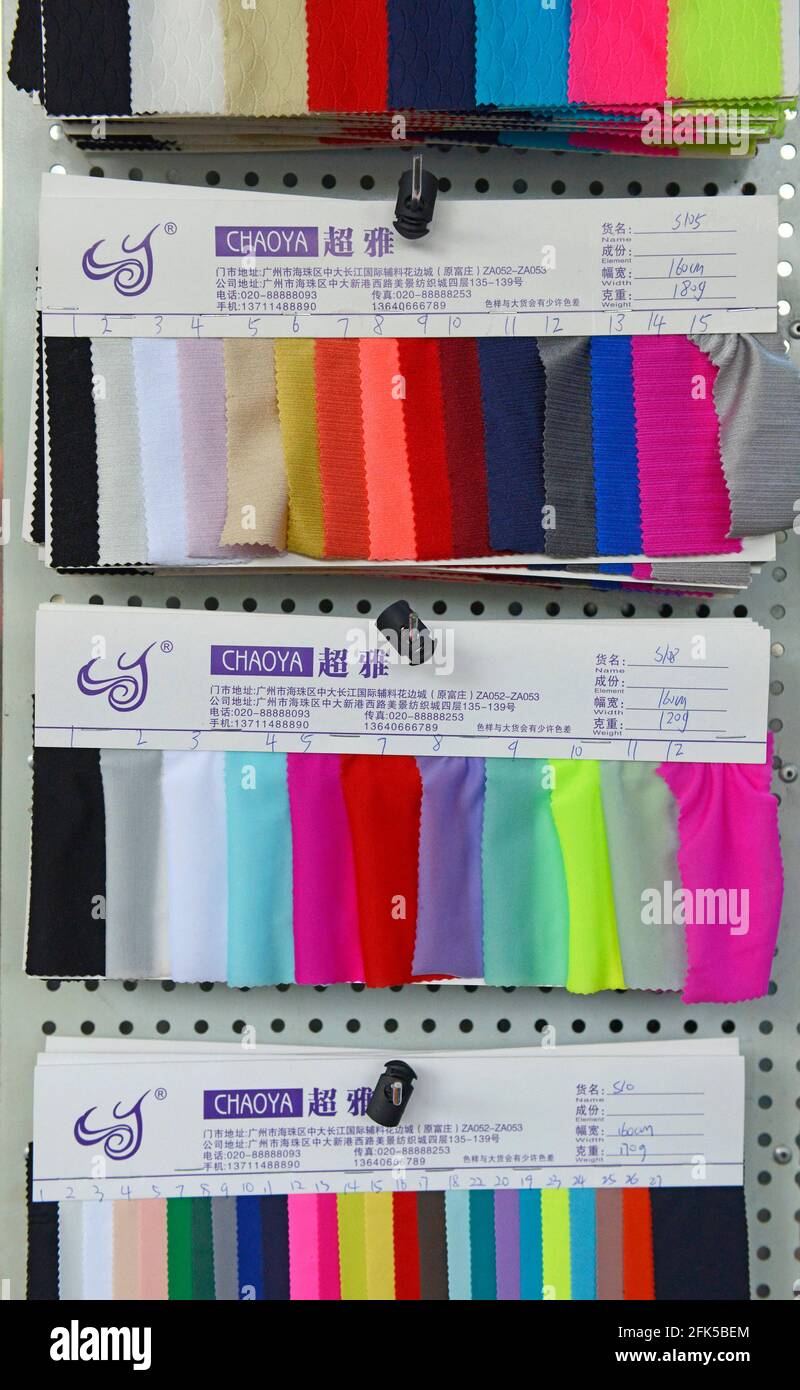 Coloured cloth swatches at a cloth and clothes-making store in ...