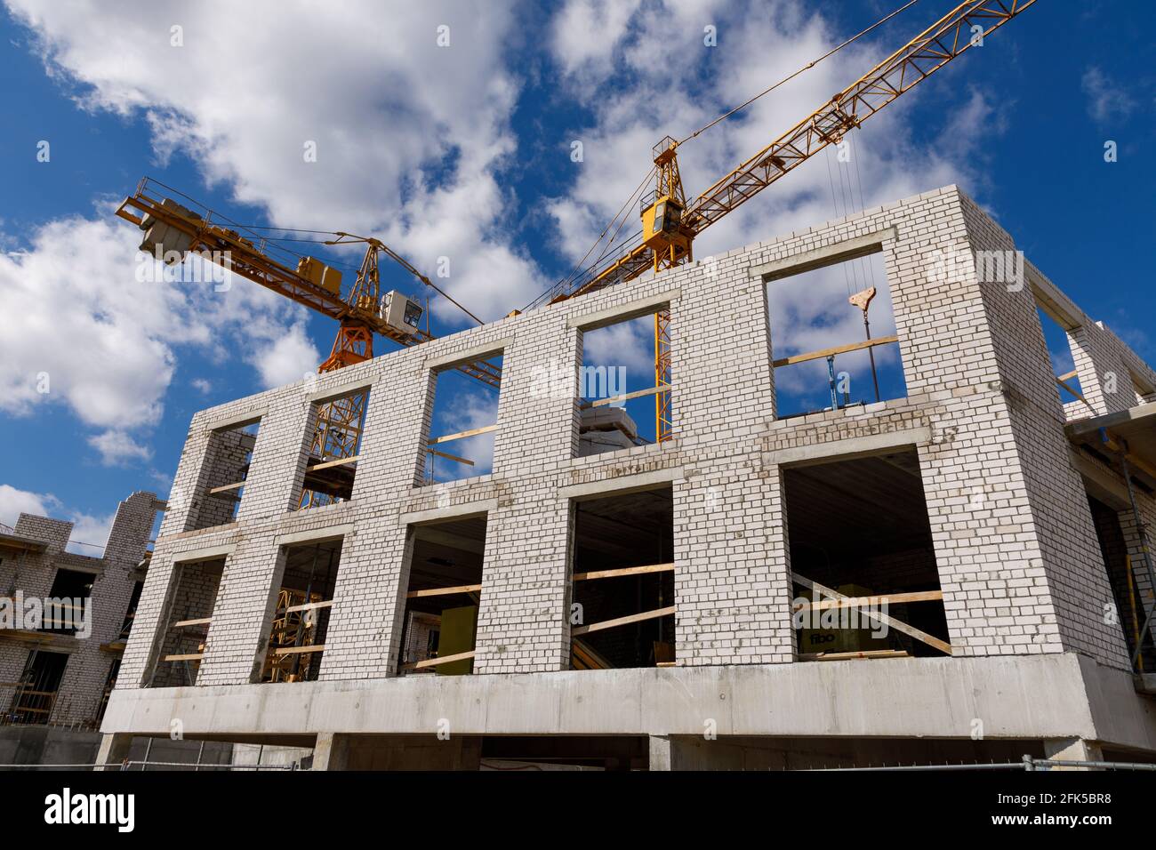 Unfinished construction of a multi-store residential building and a ...