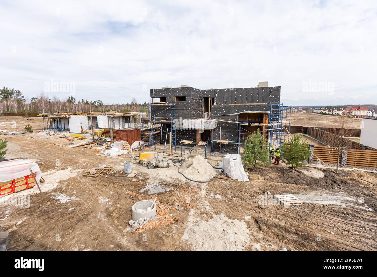 Building Construction Site in progress to new house Stock Photo - Alamy