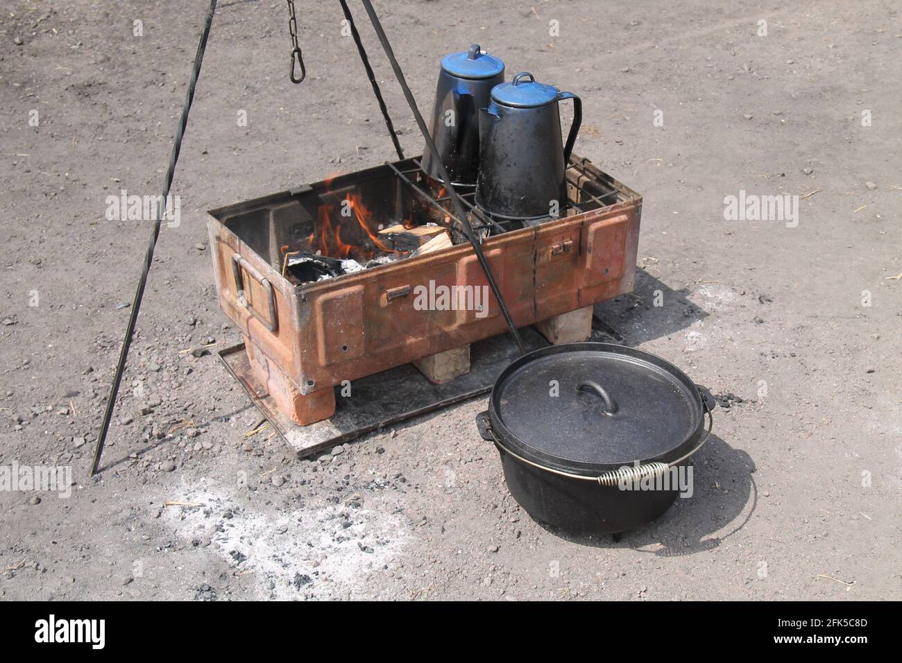 A Basic Outdoor Wood Stove Made from a Metal Box Stock Photo - Alamy