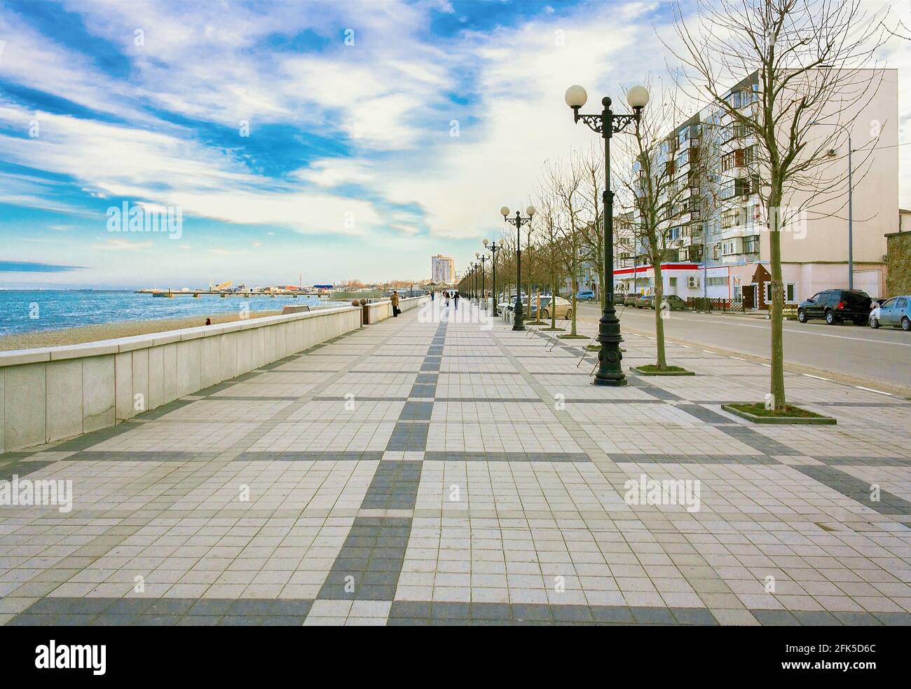 street, embankment covered with paving slabs, in the city of ...