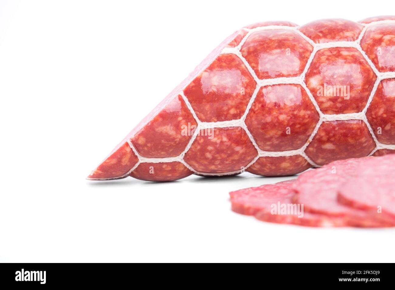 Delicious italian salami sausage in natural casing. Macro. Isolated on ...