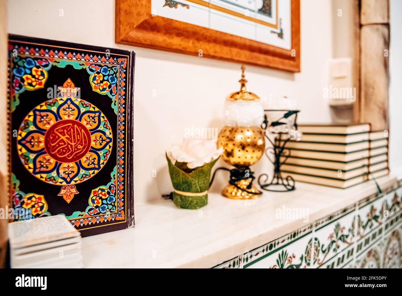 Muslim religious symbols and Koranic books Stock Photo - Alamy