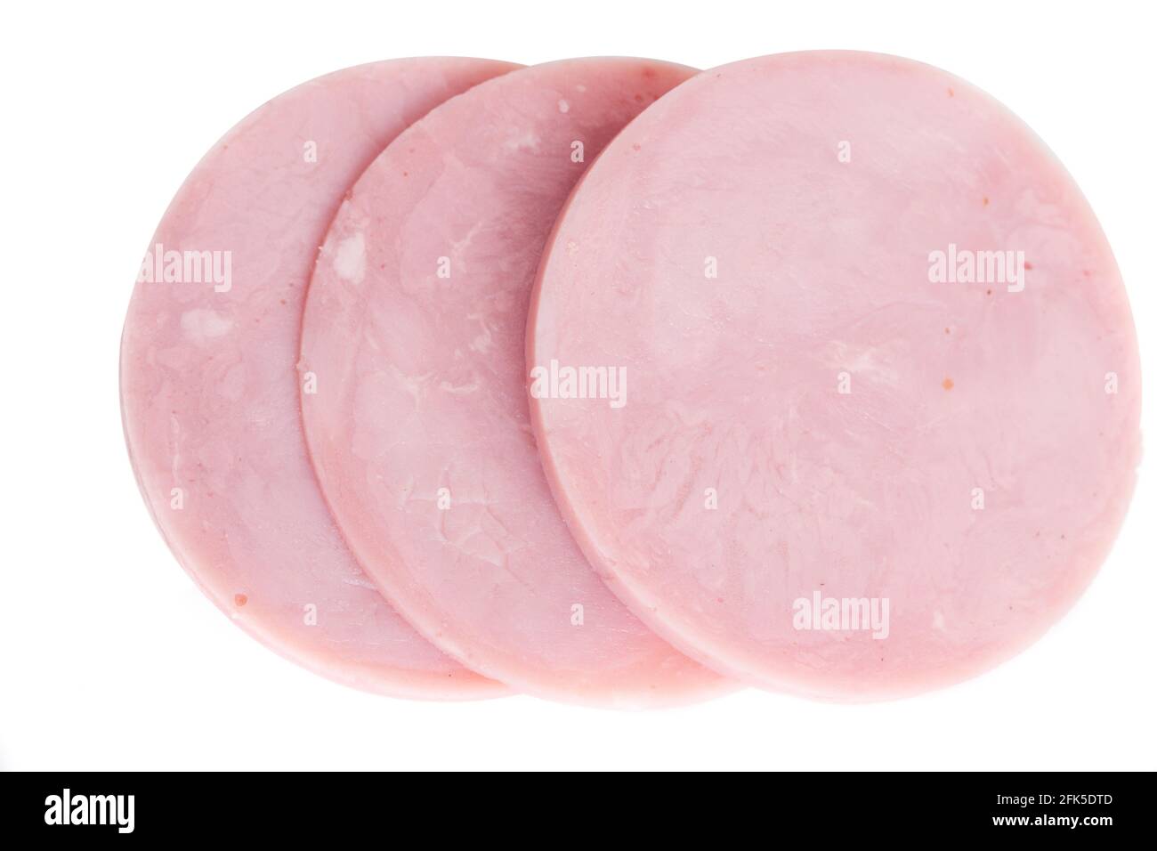 Delicious sliced chicken ham. Macro. Isolated on a white background ...