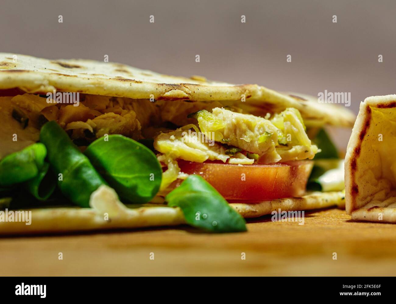 Piadina stuffed with chicken Stock Photo - Alamy