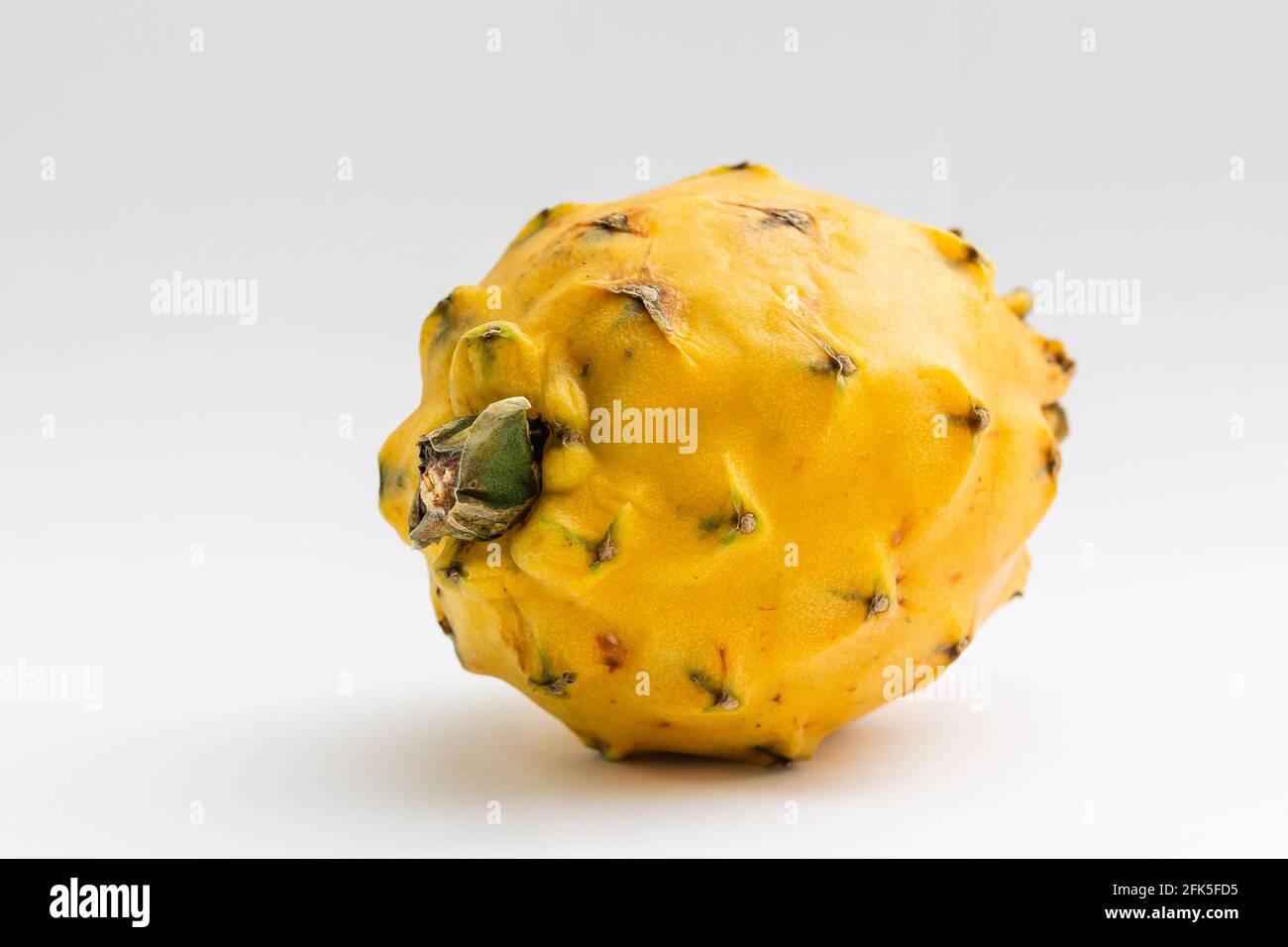 yellow pitahaya on white background Stock Photo - Alamy