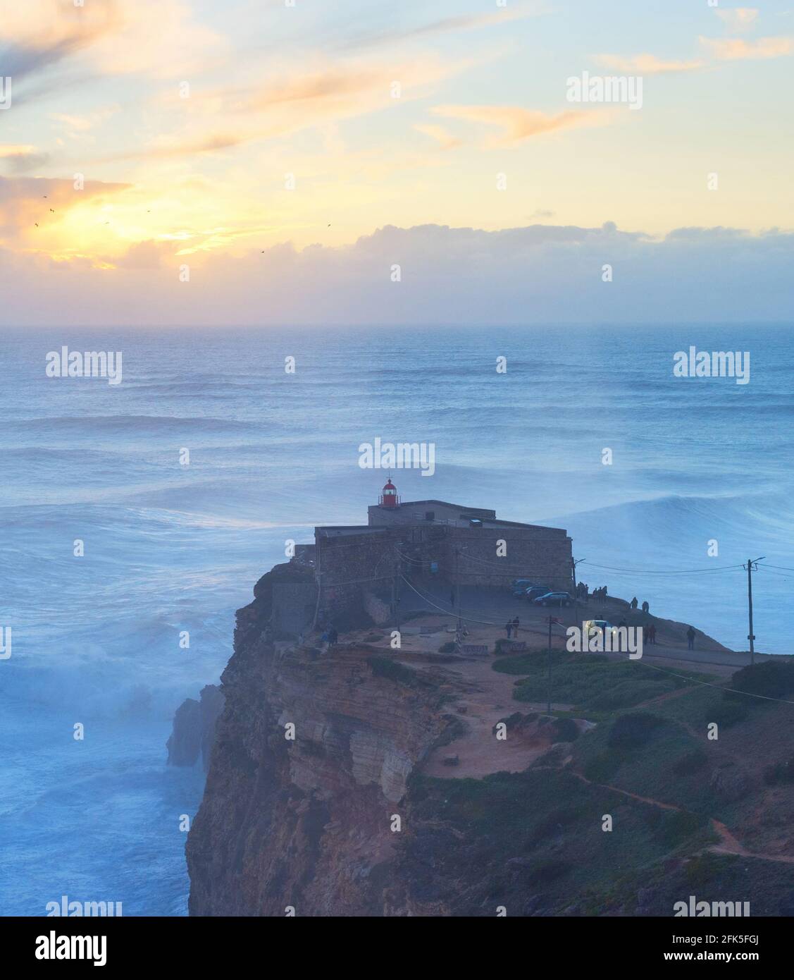Famous Nazare lighthouse at sunset. Nazare, Portugal Stock Photo - Alamy