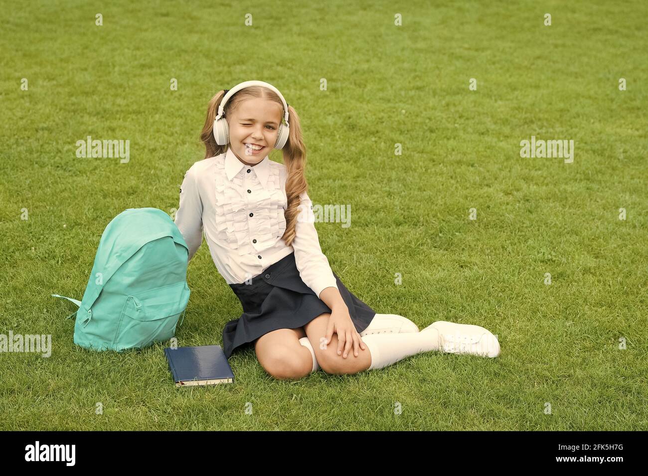 Education is safeguard. cute girl listen music. happy preschool girl ...