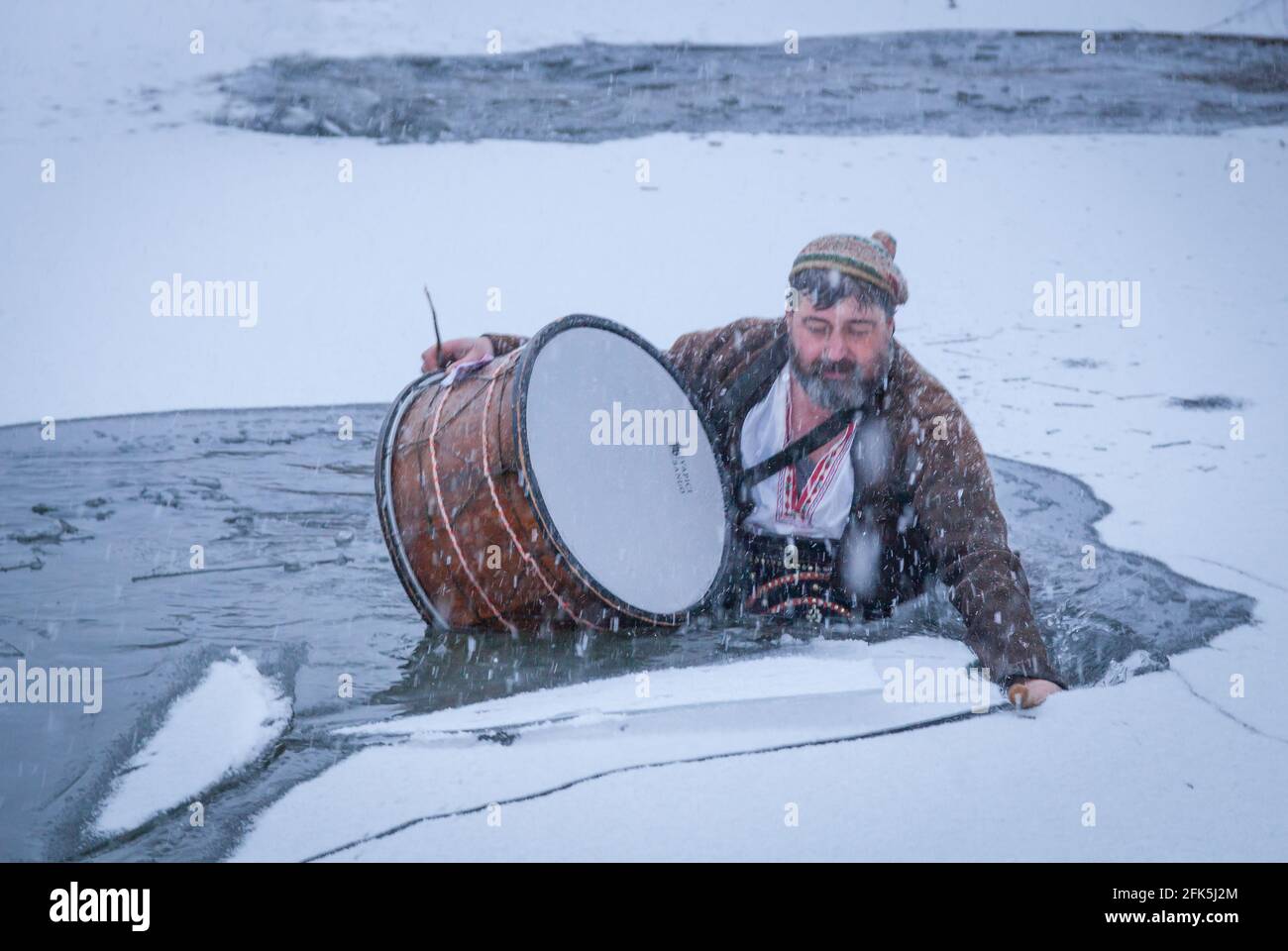 January 6: Epiphany Traditions - Jordan Day. Drummer breaks the ice of ...