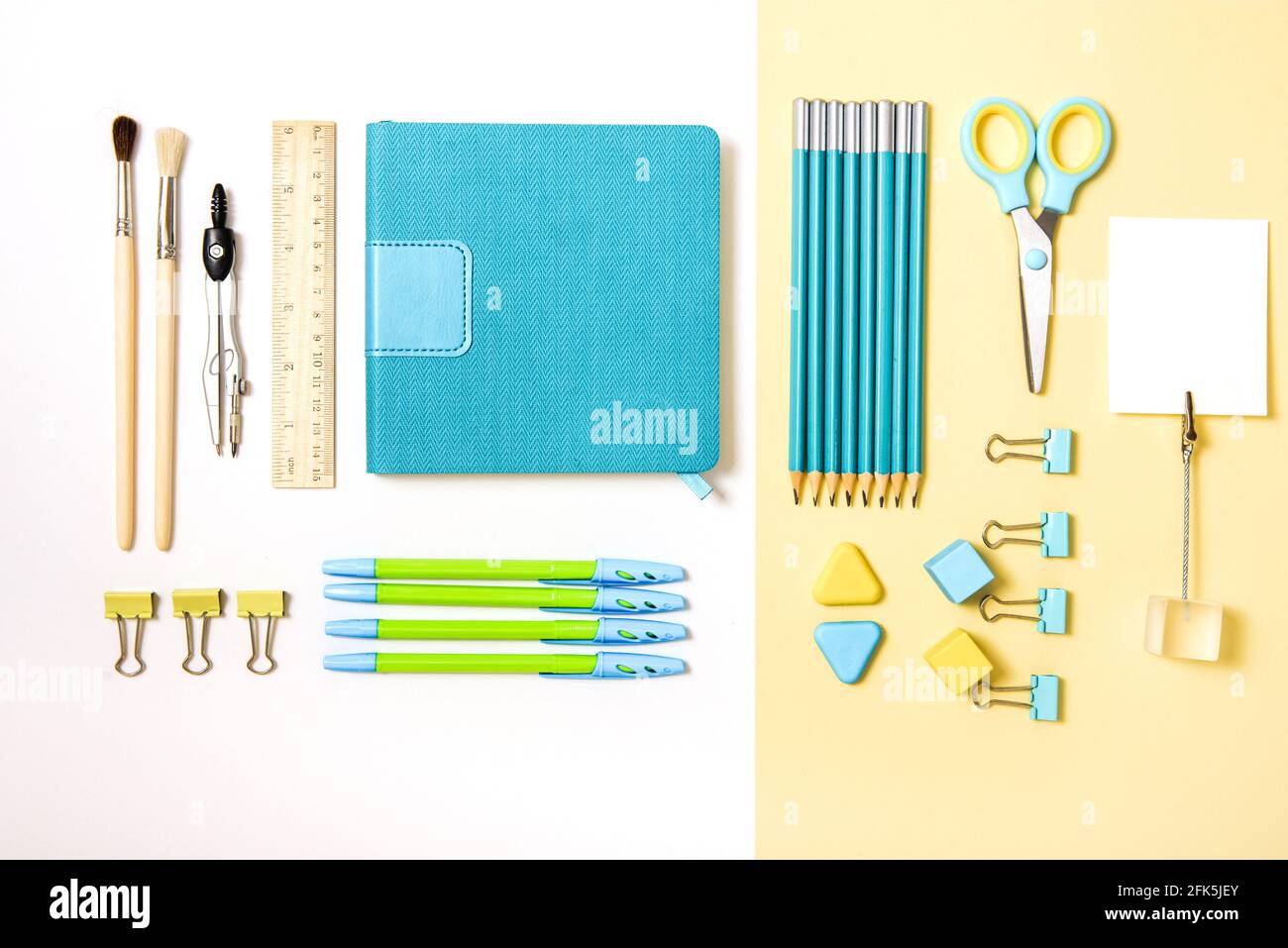 school tools on blue and yellow background. top view knolling.back to ...