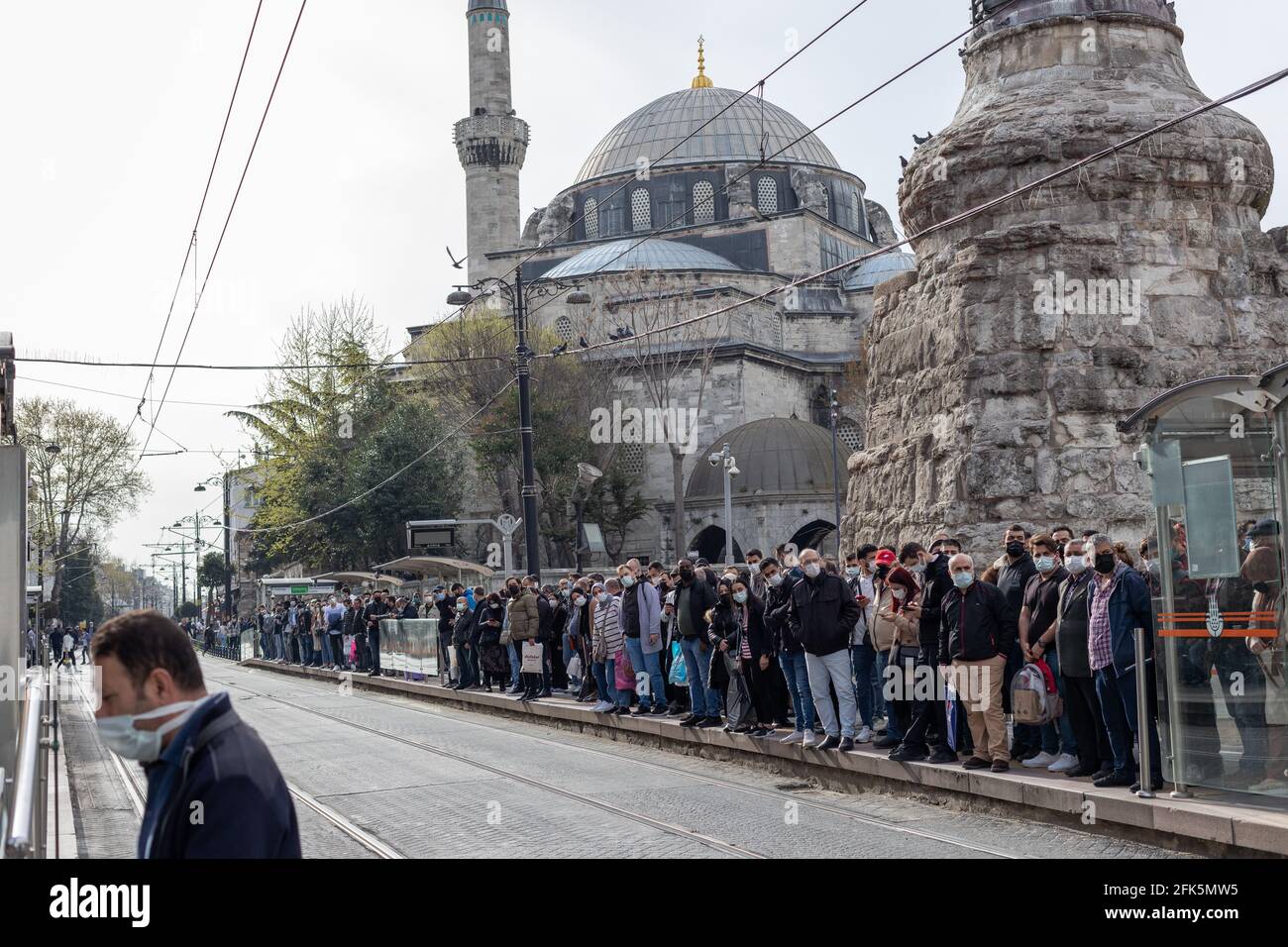 The crowd waiting at the Cemberlitas tram stop during the coronavirus ...