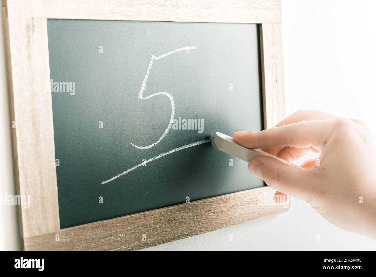 Number 5 Handwritten With Chalk On A Blackboard Stock Photo - Alamy
