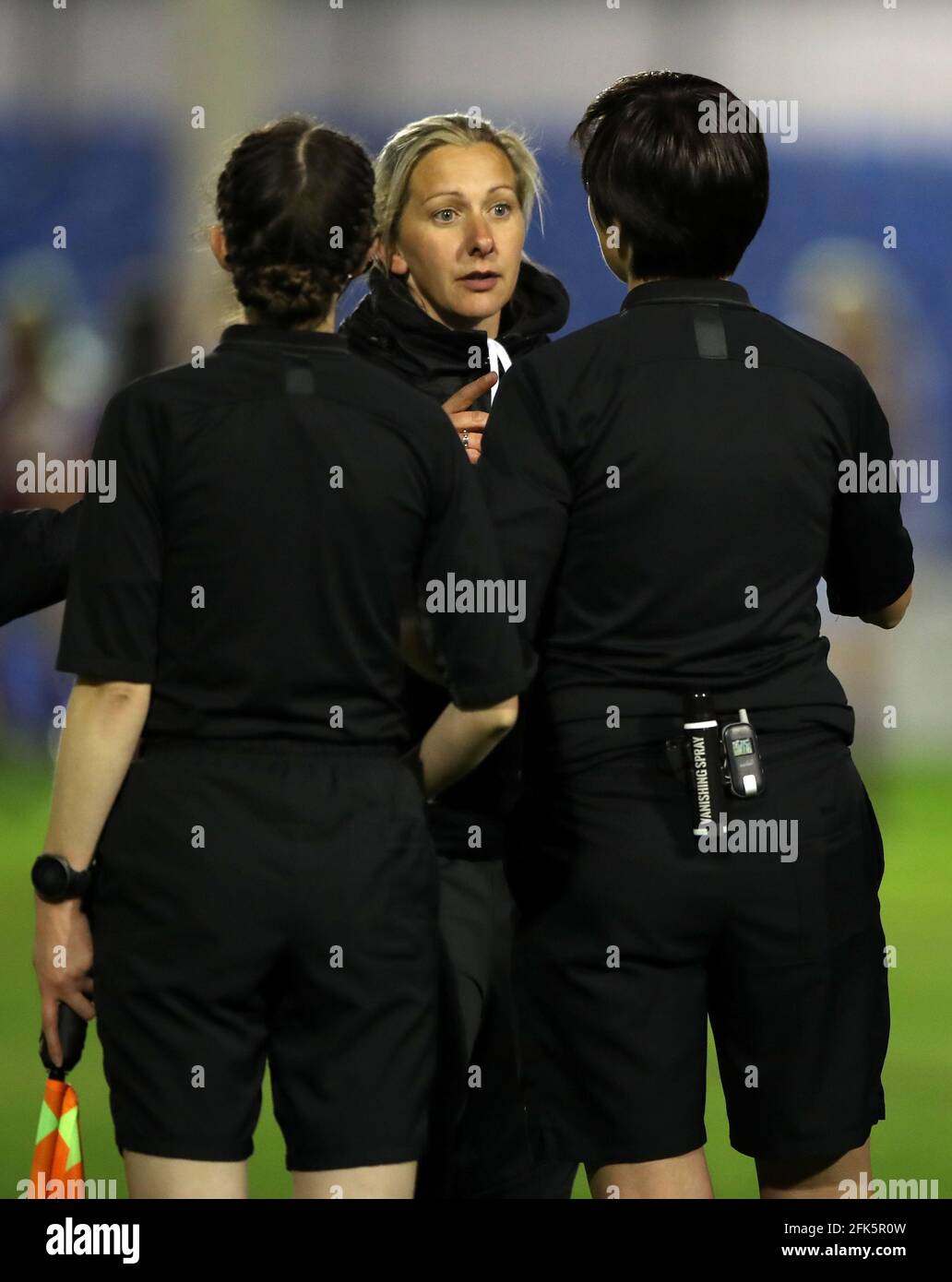 Birmingham City head coach Carla Ward (centre) speaks to referee ...