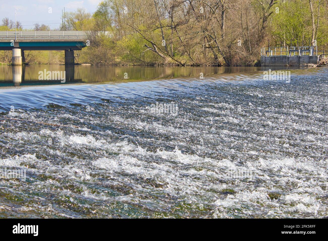 Bubbling river flow through the forest Stock Photo - Alamy