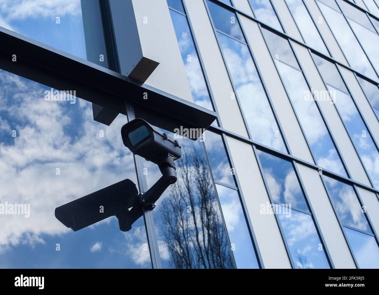 Outdoor CCTV - security camera in a modern office. Black cam Stock ...