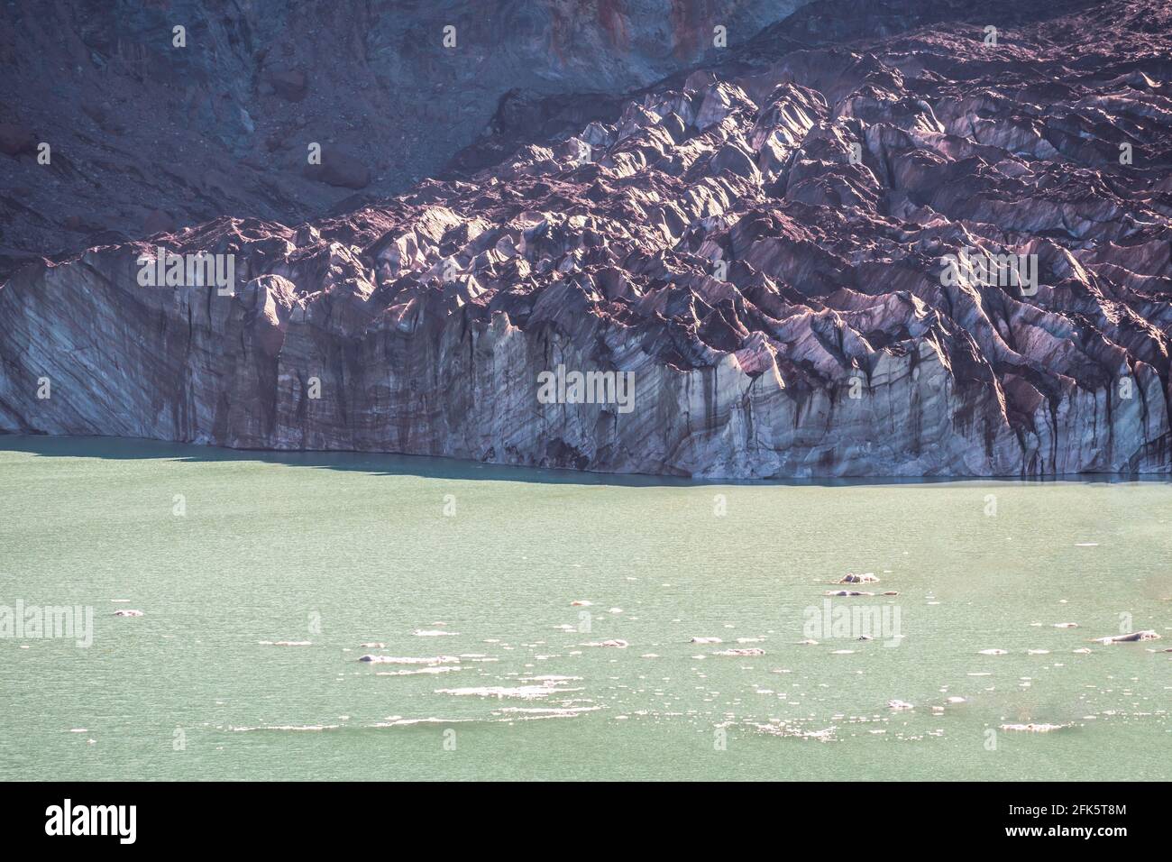 Beautiful shot of sharp cliffs and rock formations near a lake Stock ...