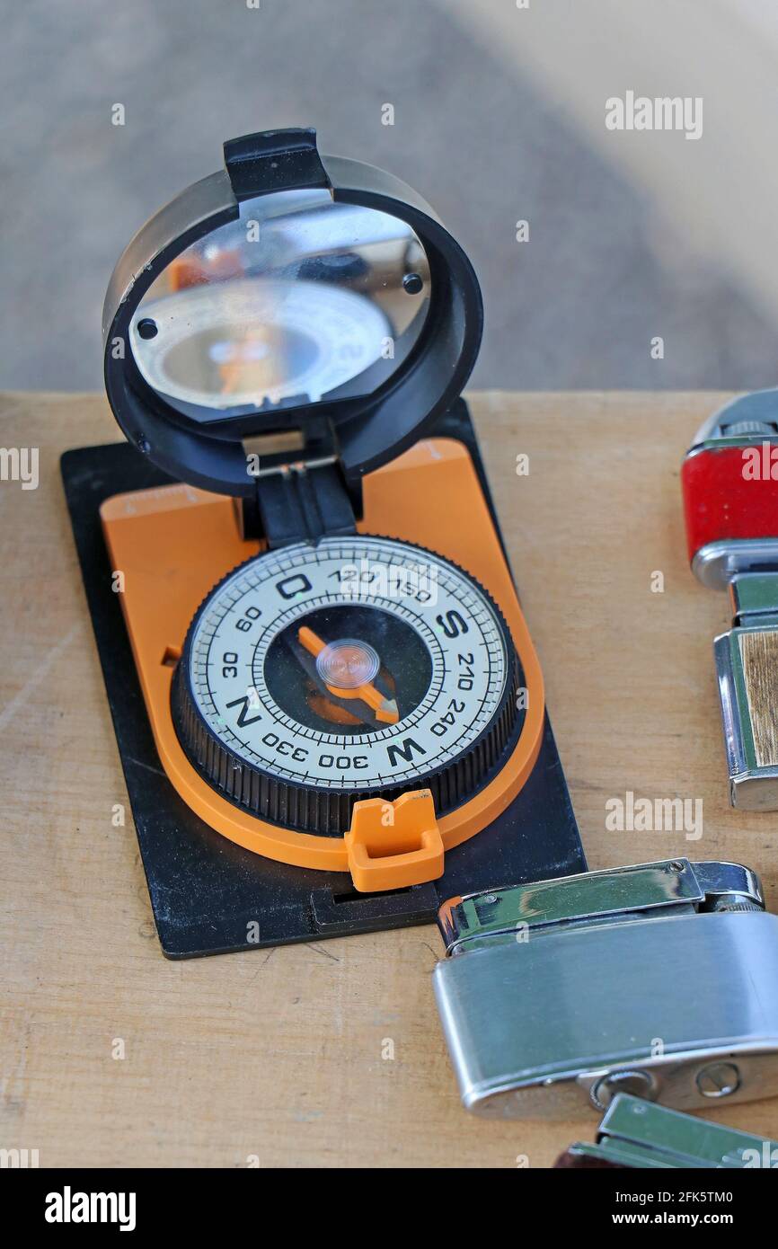 Vintage field compass with magnifying mirror tool outdoors Stock Photo ...