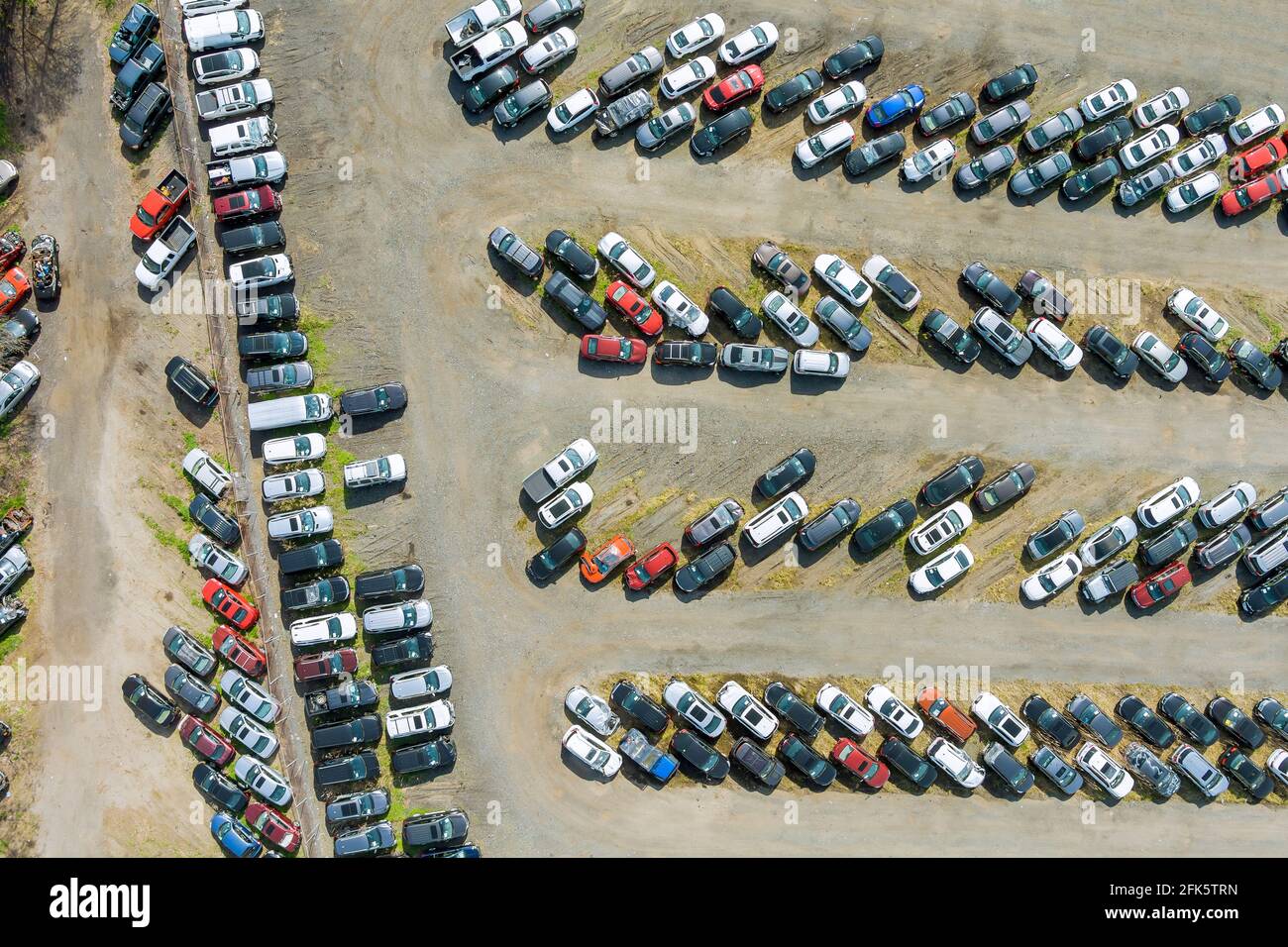 Aerial view of many used car auction lot parked distributed in a ...