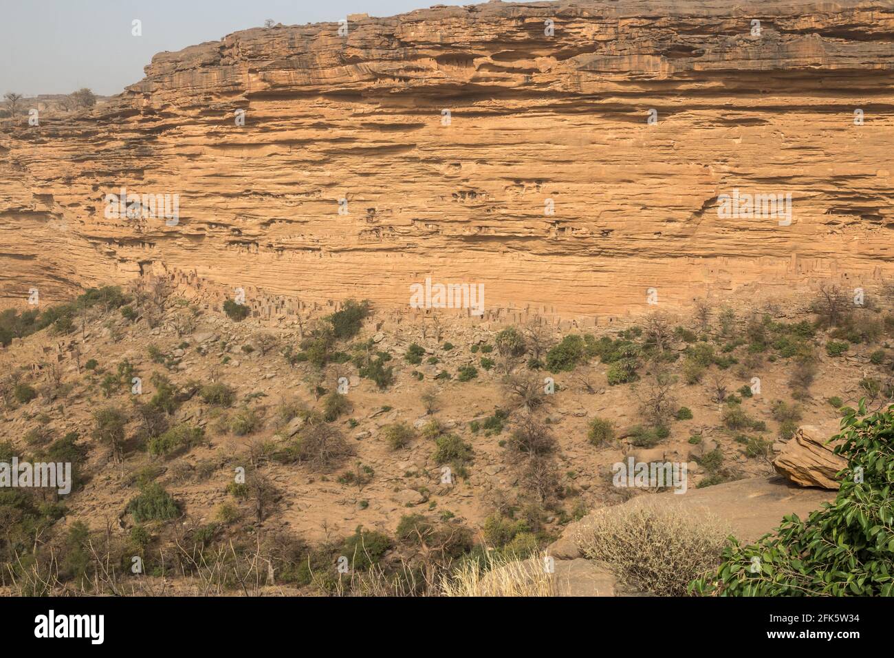 Cliff dwellings along the base of the Bandiagara escarpments, Mali ...