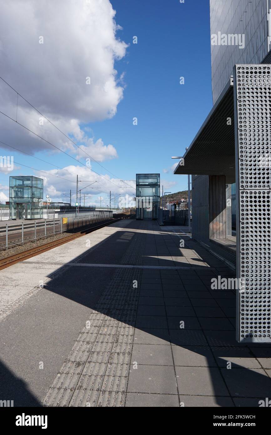 View of an outdoor platform of a railway station Stock Photo - Alamy